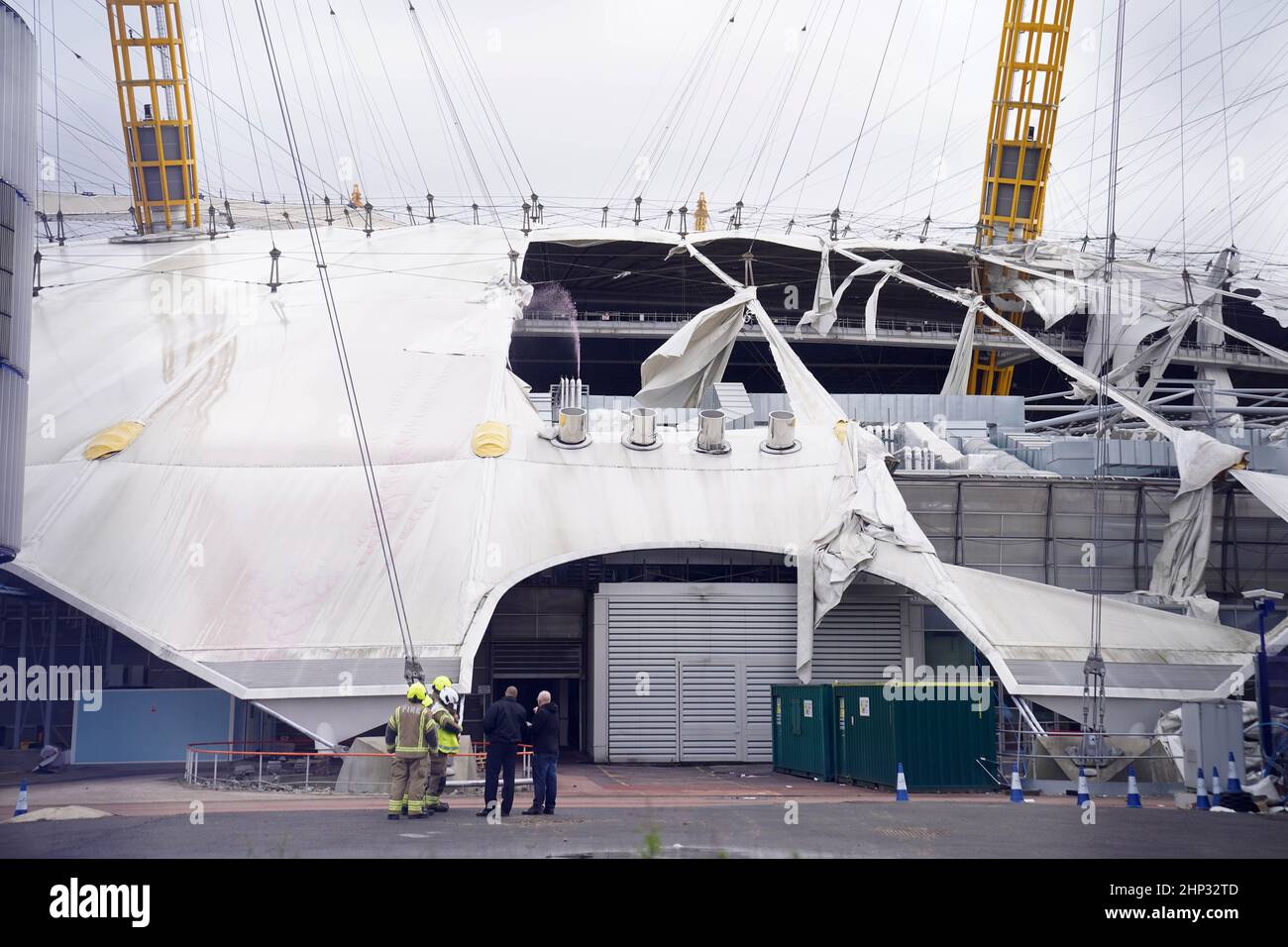 Emergency services look at the damage to the roof of the O2 Arena ...