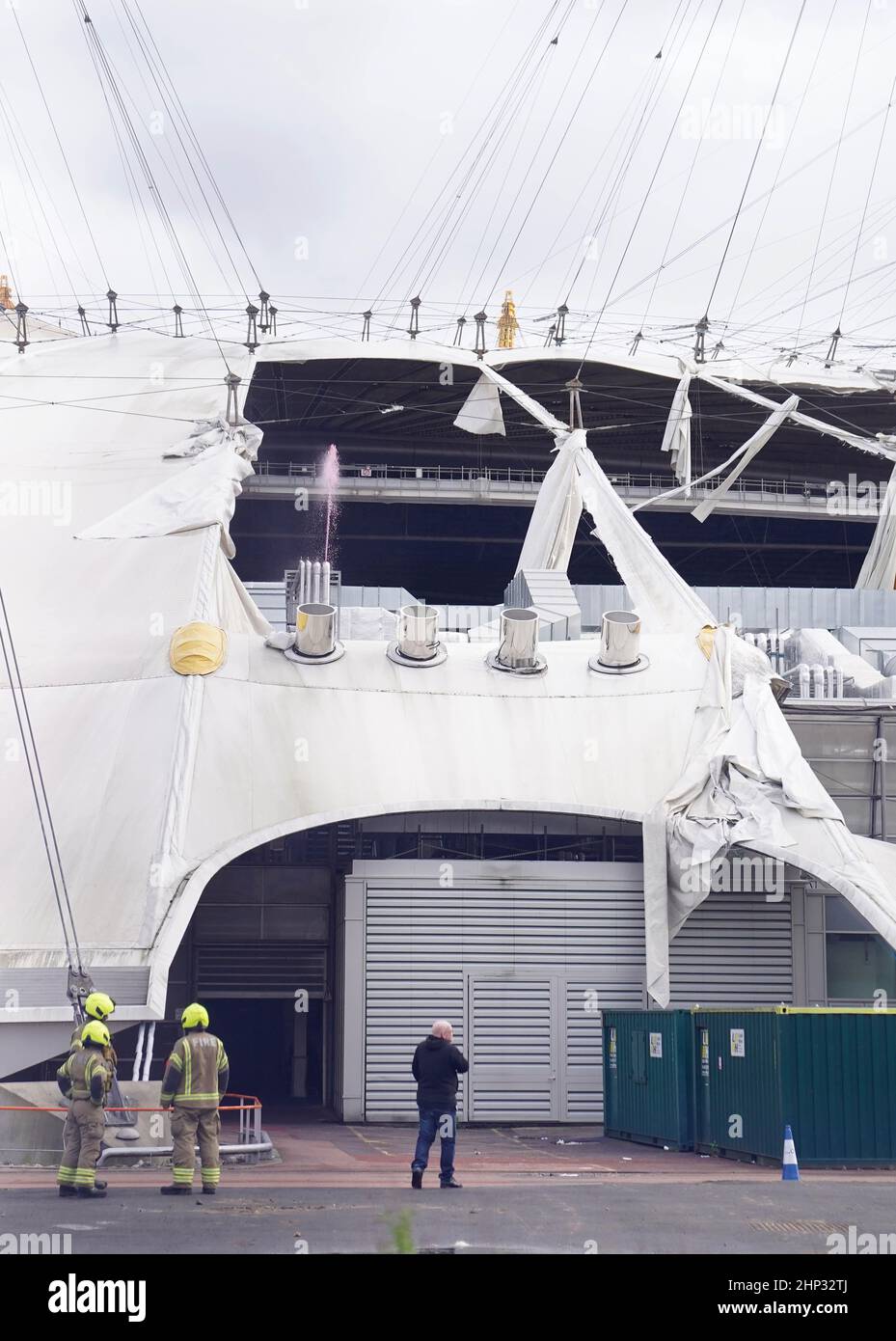 Emergency services look at the damage to the roof of the O2 Arena ...
