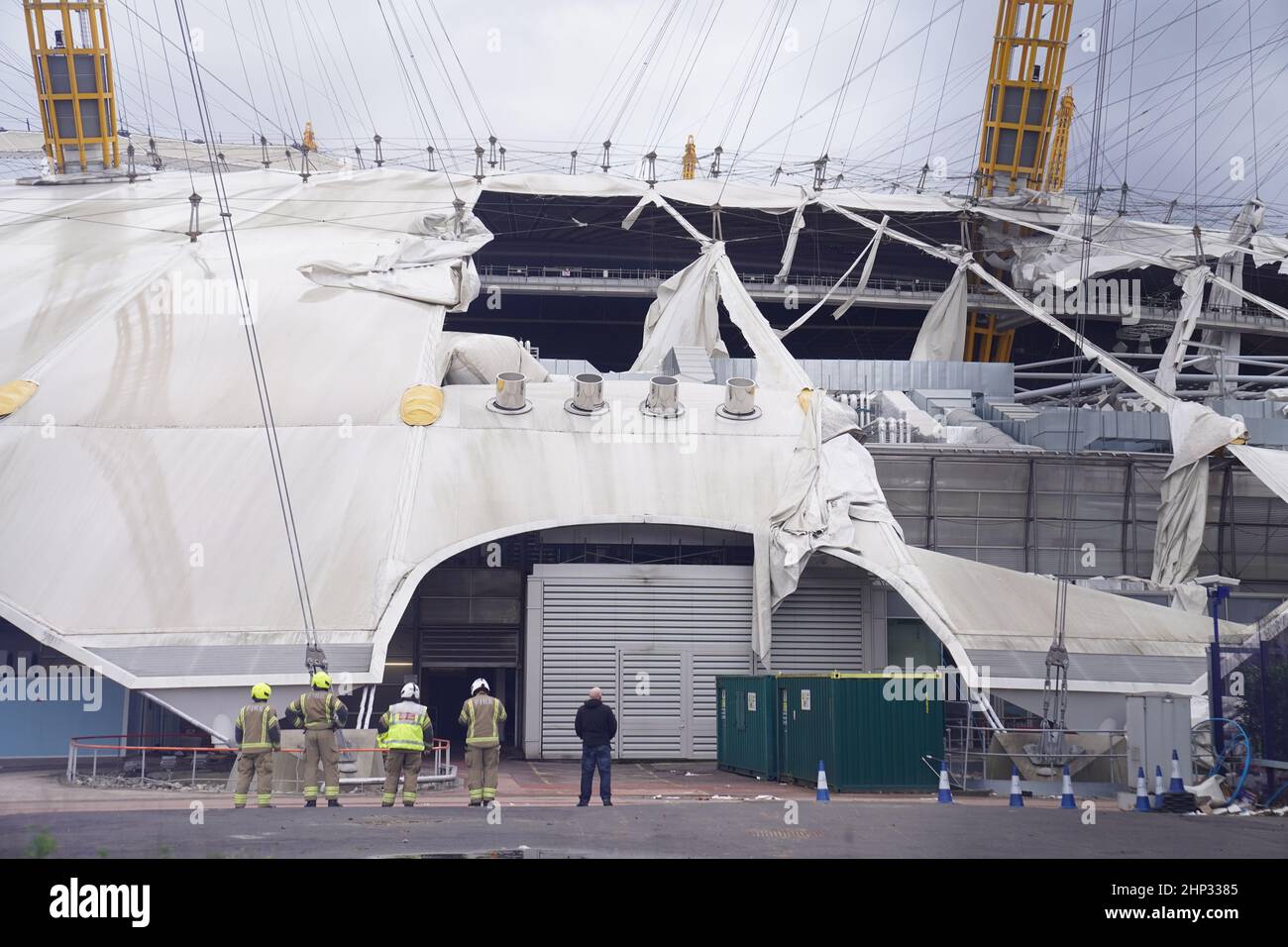 Emergency services look at the damage to the roof of the O2 Arena ...