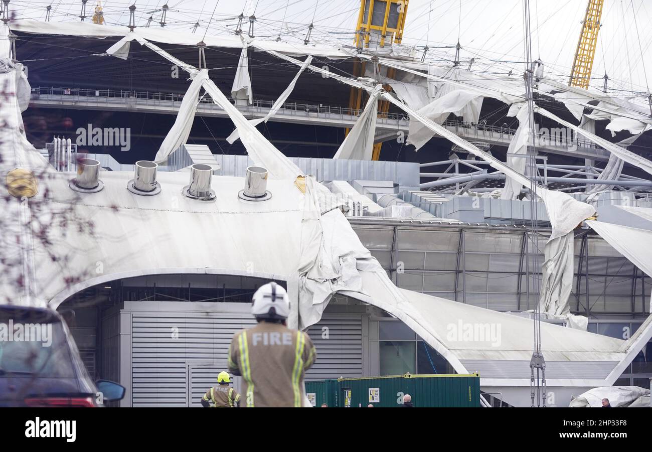 Emergency services look at the damage to the roof of the O2 Arena ...