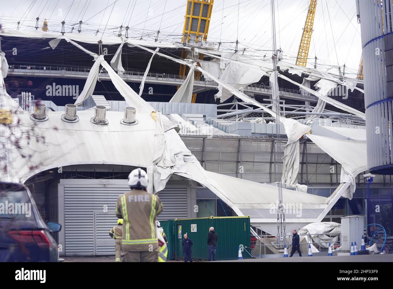 Emergency services look at the damage to the roof of the O2 Arena ...