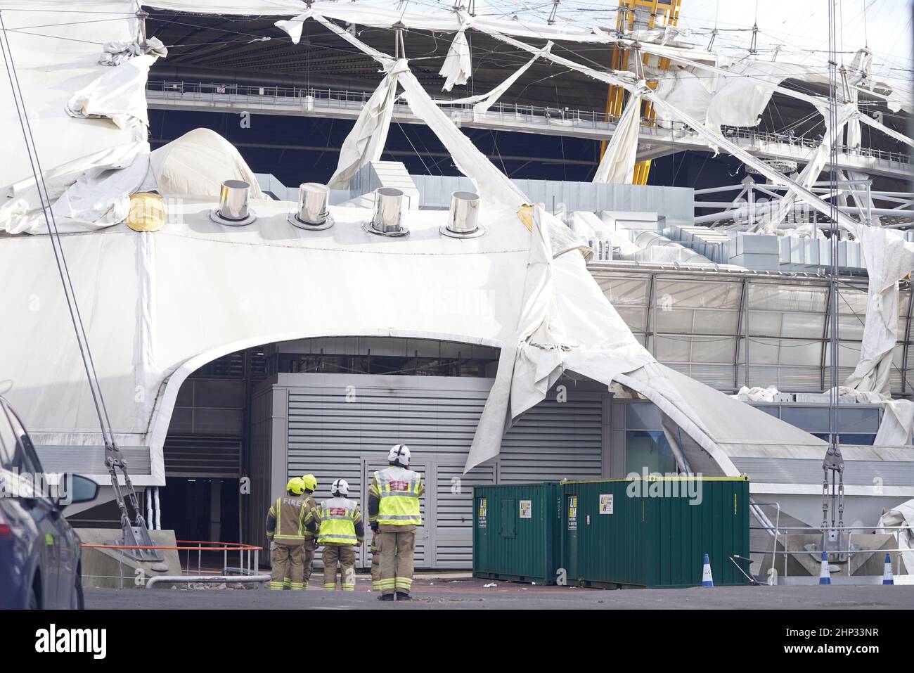Emergency services look at the damage to the roof of the O2 Arena ...