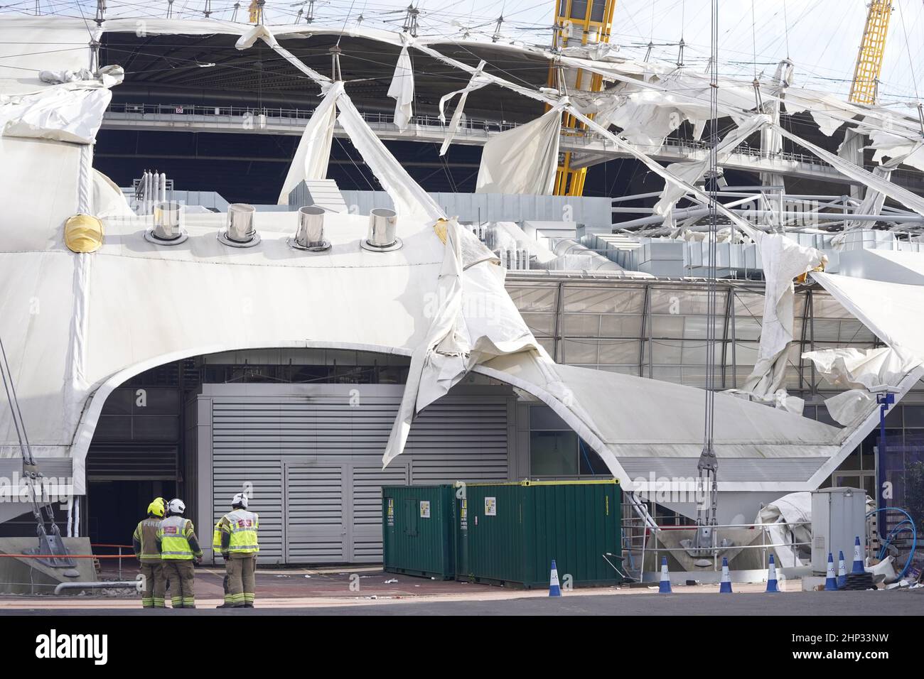 Emergency services look at the damage to the roof of the O2 Arena ...