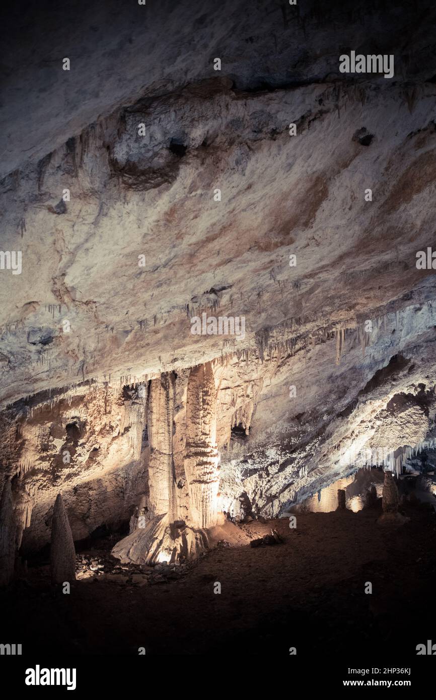 Image of a giant stalagmite in a an underground cave Stock Photo - Alamy
