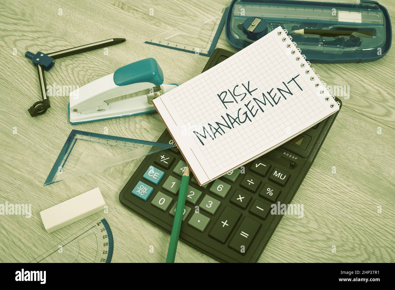 Hand writing sign Risk Management, Business overview evaluation of ...