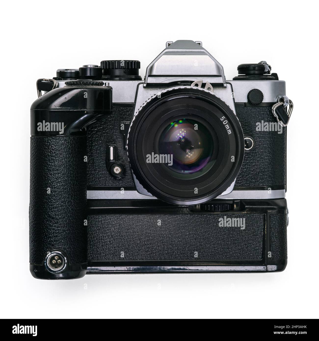 Antique 35mm SLR film camera with motor drive isolated on white ...