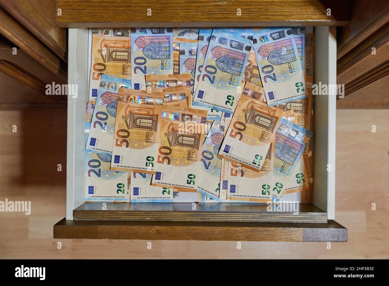 Cash money banknotes in a drawer of Euros Stock Photo - Alamy