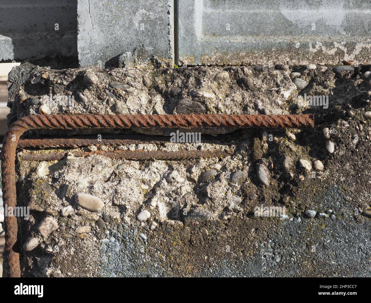 damaged reinforced concrete with exposed rusted steel resistance bars ...