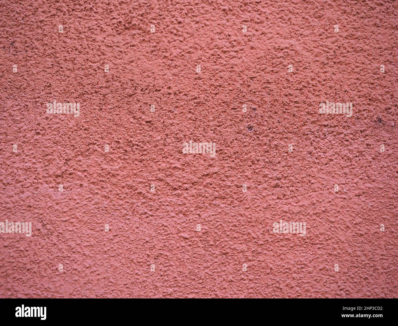 red plaster wall useful as a background Stock Photo - Alamy