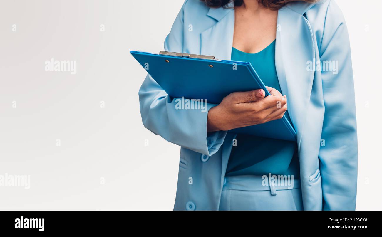 Young business woman her holding file document isolate on white ...