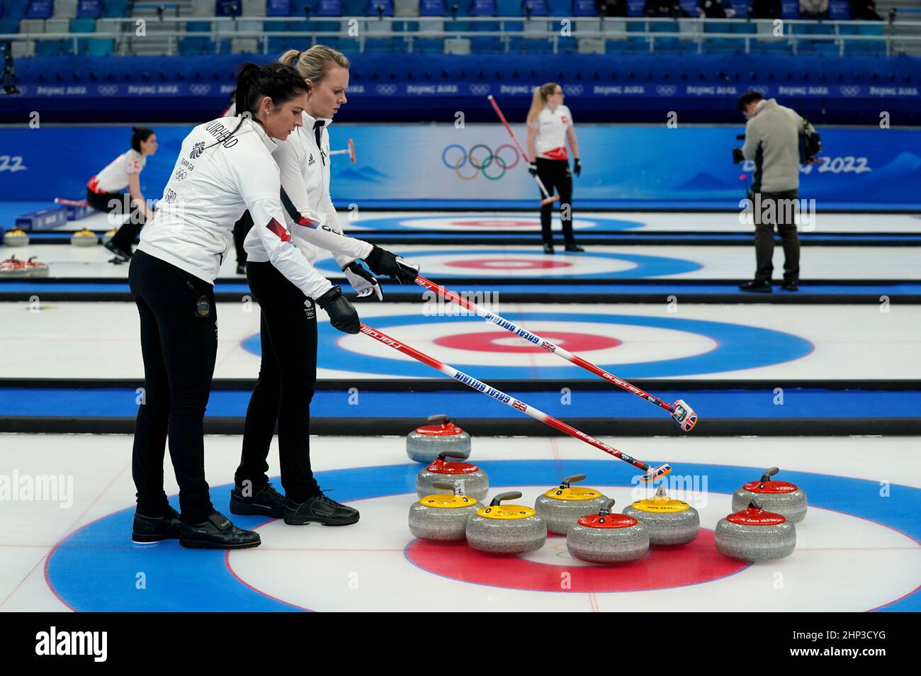 Great Britain's Eve Muirhead (left) and Vicky Wright by the head in the ...