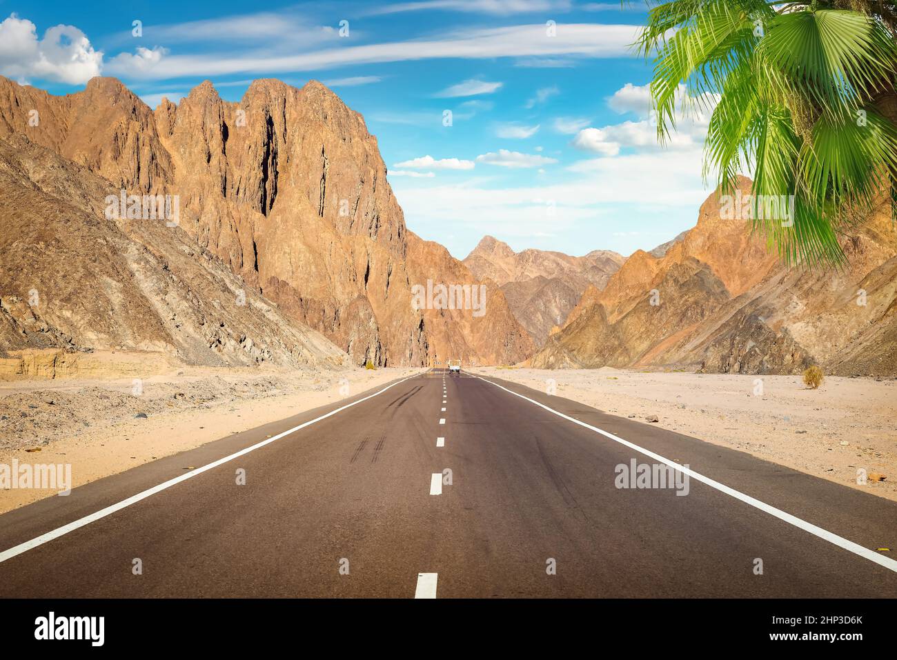 Road in the desert of Egypt at sunset Stock Photo - Alamy