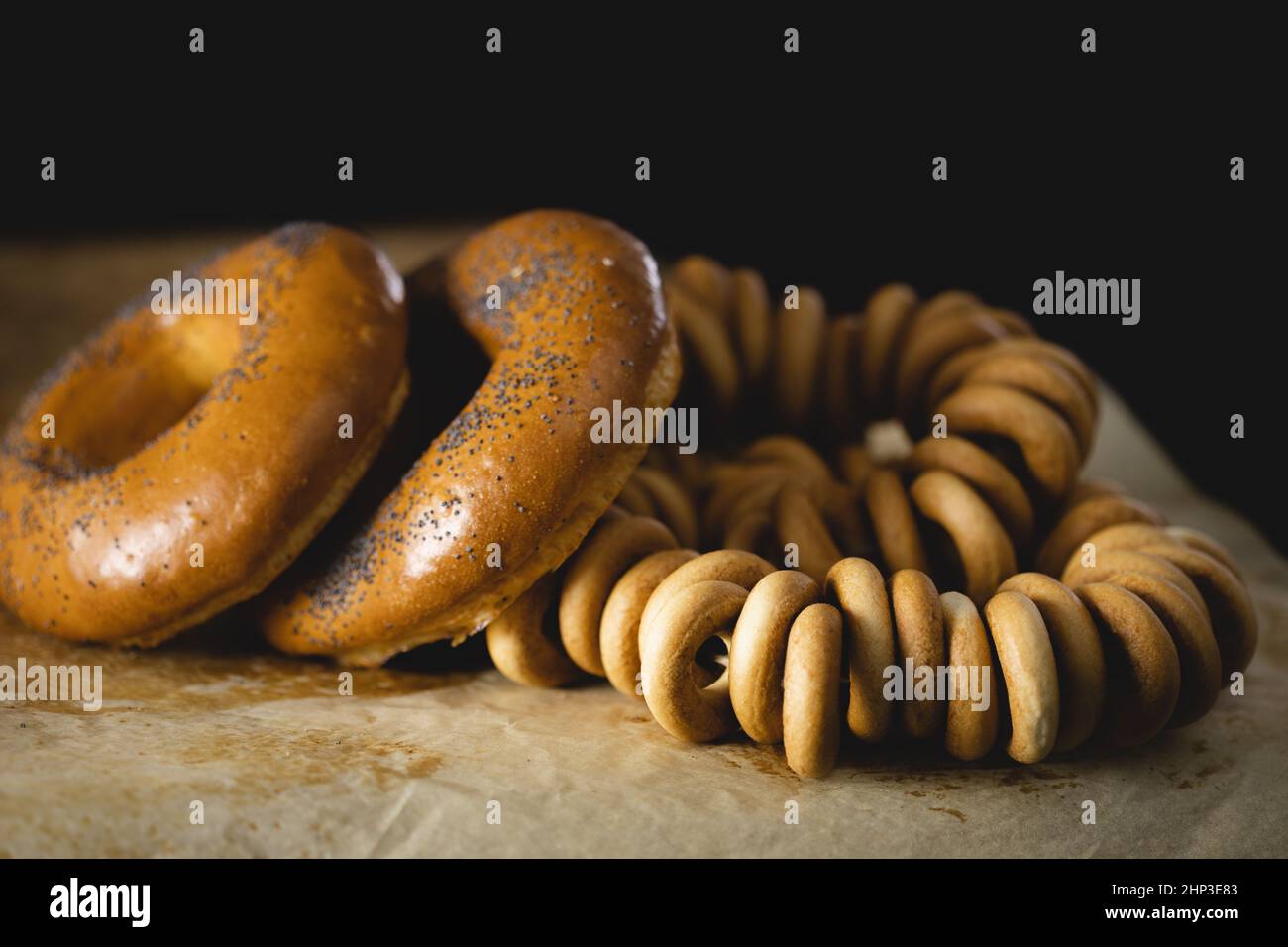 bun in the form of a ring decorated with poppy seeds and a bunch of ...