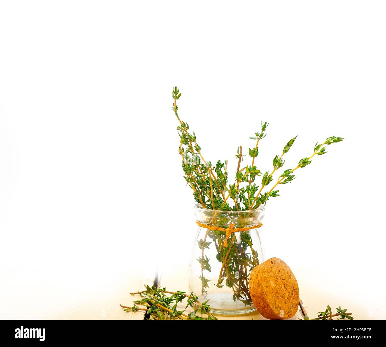 fresh thyme on a glass jar over a white wood rustic table Stock Photo ...