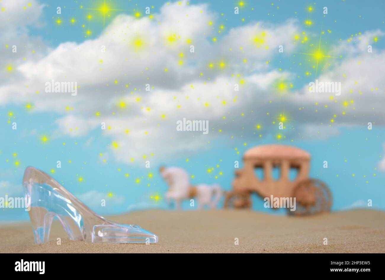 Glass Slipper on Beach With Carriage in Background Stock Photo - Alamy