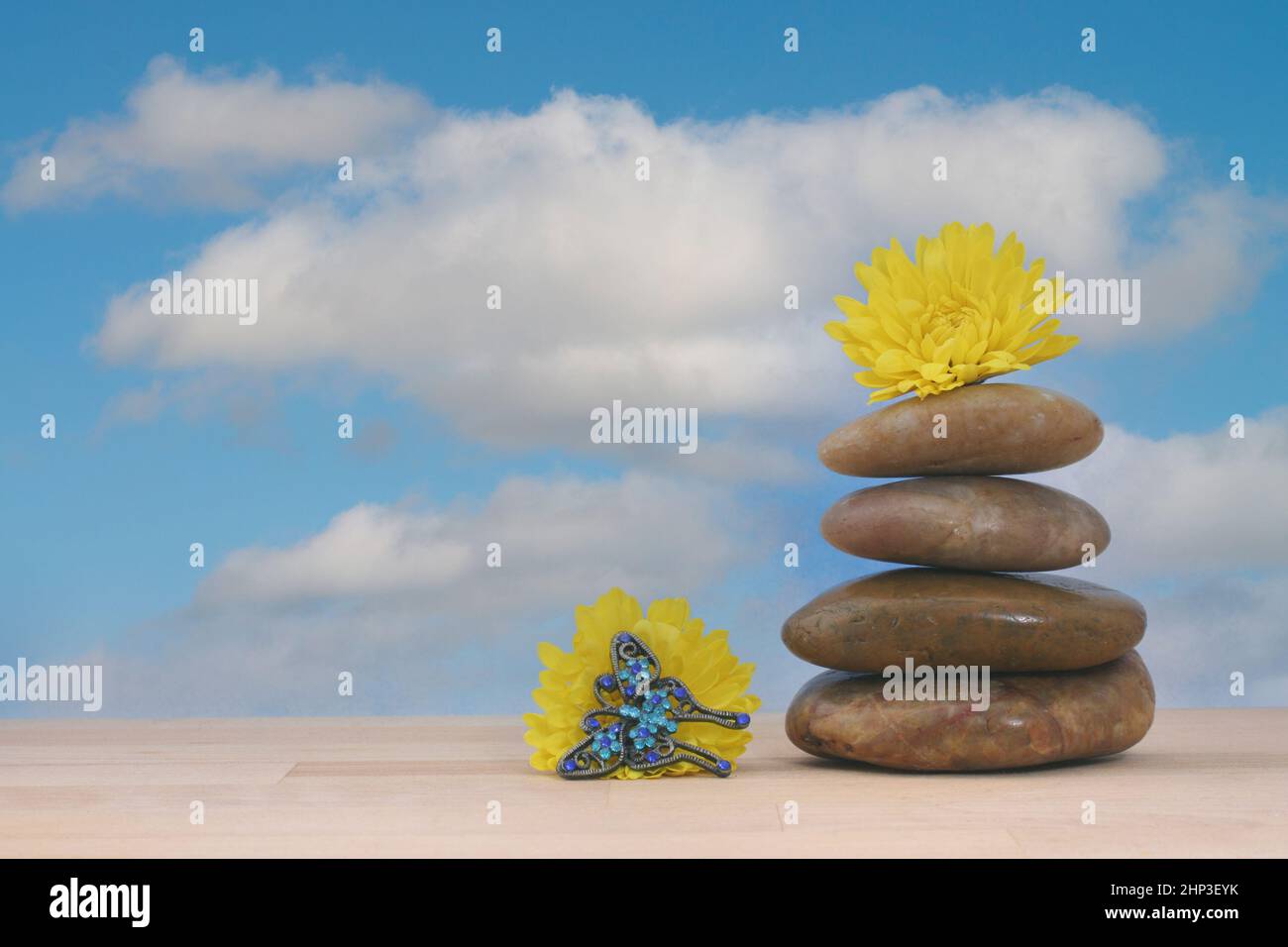 Balanced Massage Stones on Blue Textured Background Stock Photo - Alamy
