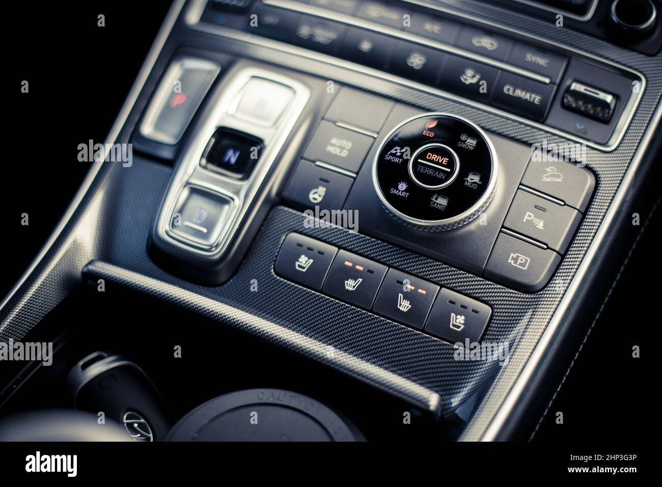 Close up shot of a modern car drive mode selector button, on the ...