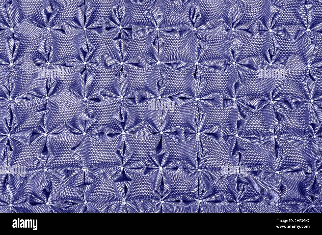 Close up background texture of violet textile puffs for Canadian ...