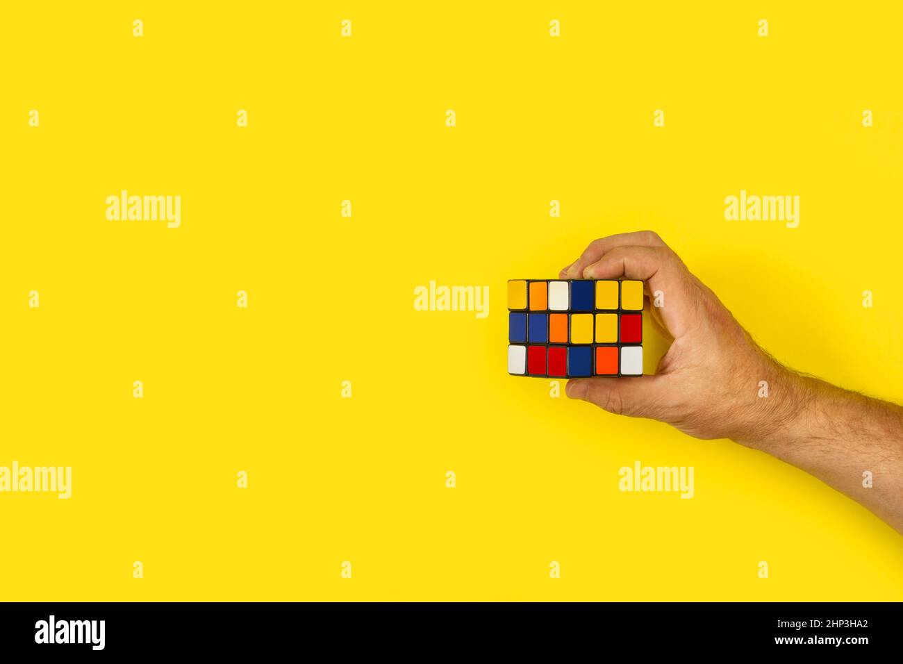 Man with rubic cube hi-res stock photography and images - Alamy