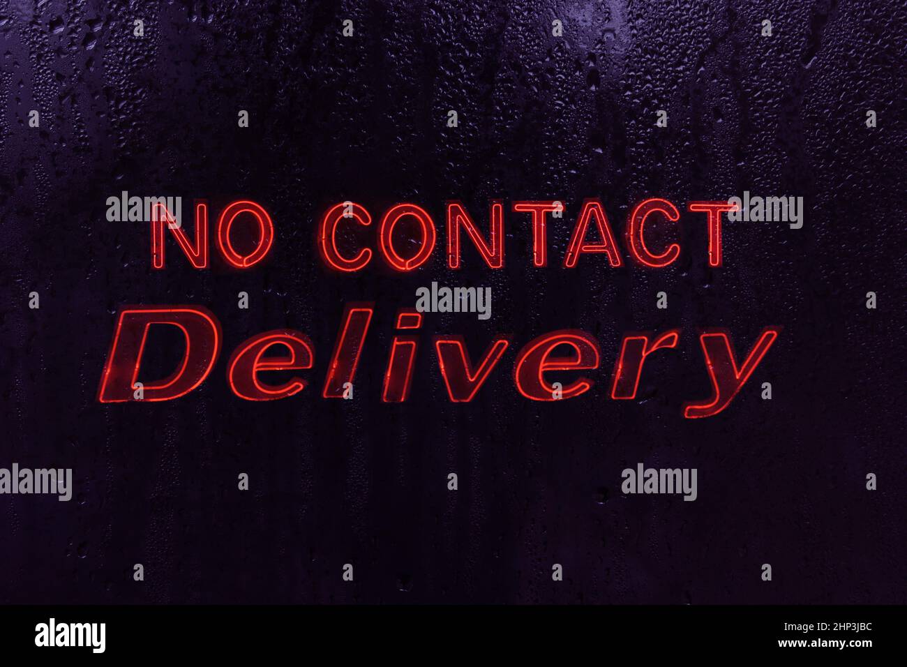 No Contact Delivery Neon Sign in Rainy Window Stock Photo - Alamy