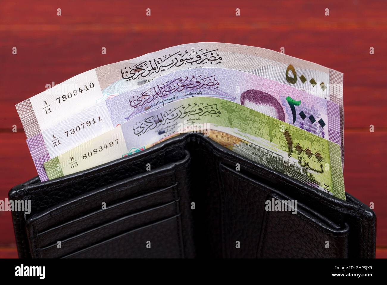 Syrian money - Pound in the black wallet Stock Photo - Alamy