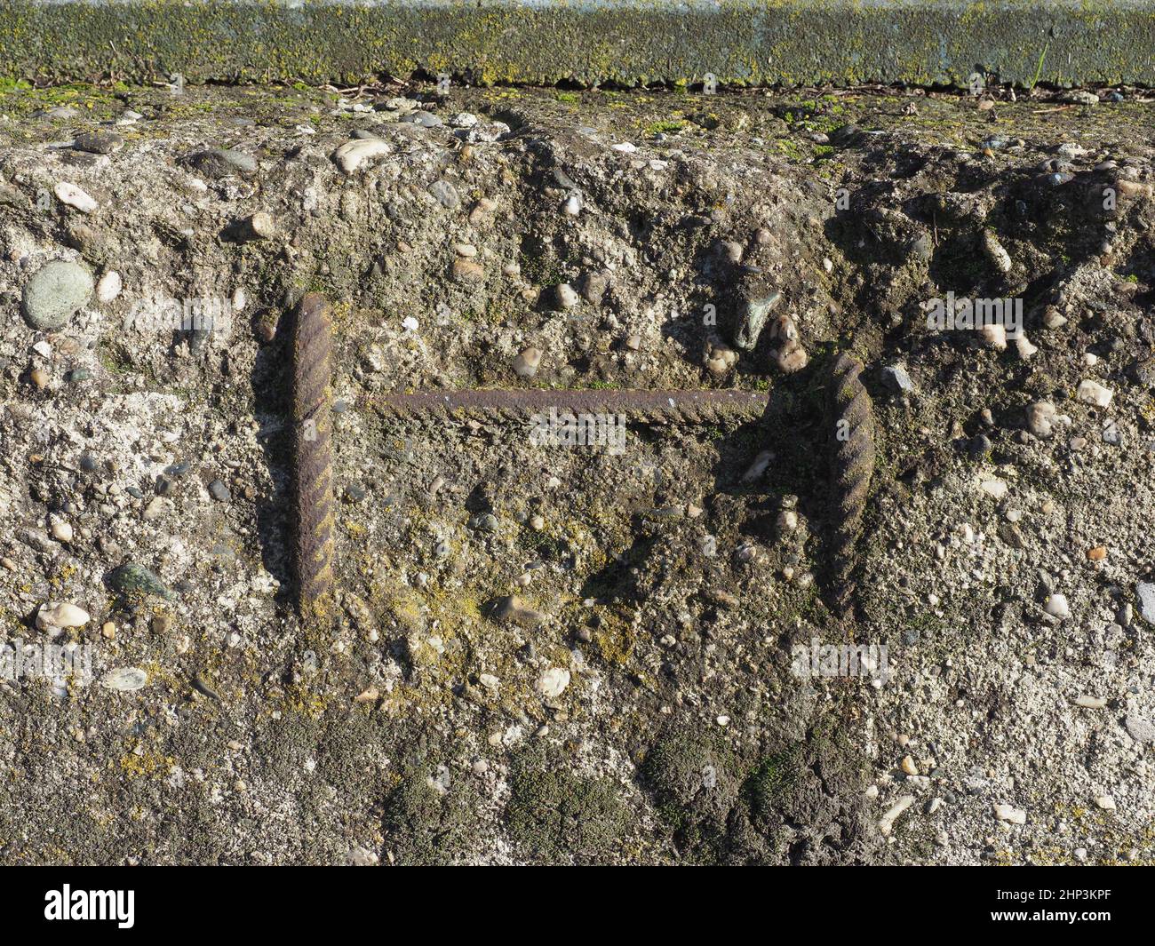 damaged reinforced concrete with exposed rusted steel resistance bars ...