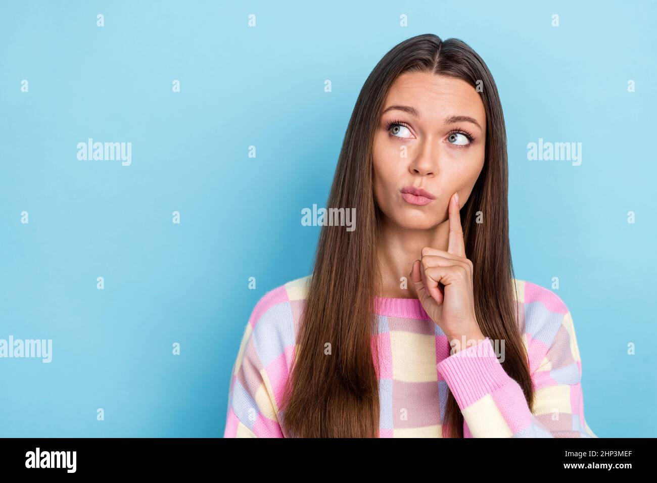 Photo of minded clever lady look empty space finger cheek wear casual ...