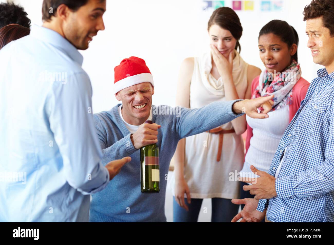 Too much of a good thing. A male employee having too much fun at the ...