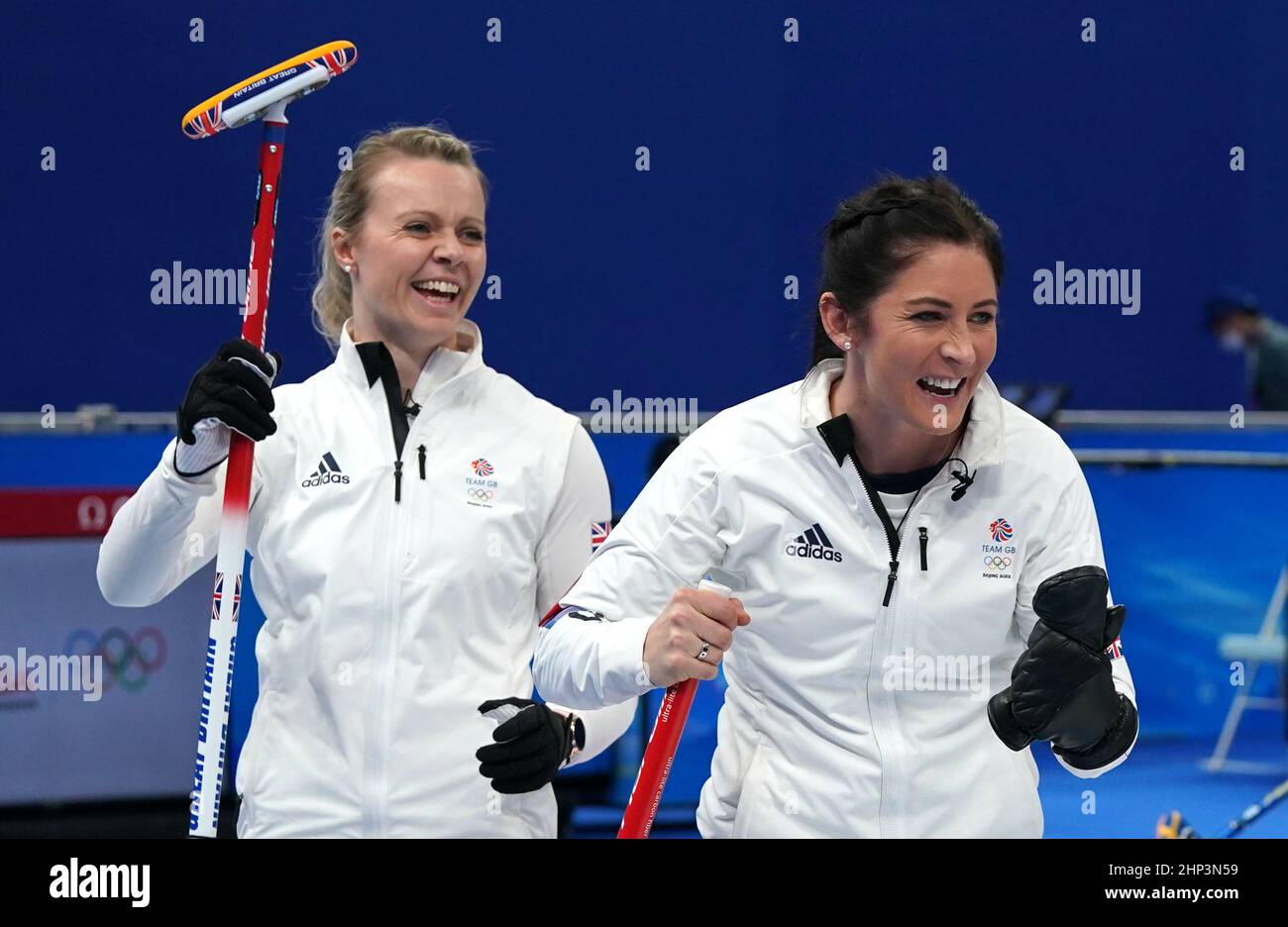 Great Britain's Vicky Wright (left) and Eve Muirhead celebrate victory ...