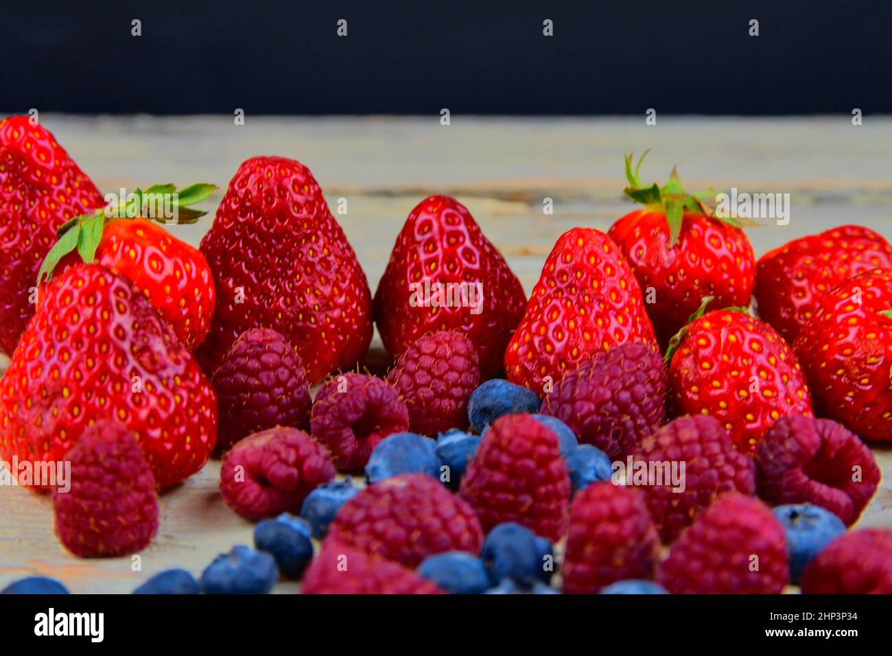 Healthy mixed fruit and ingredients with strawberry, raspberry ...