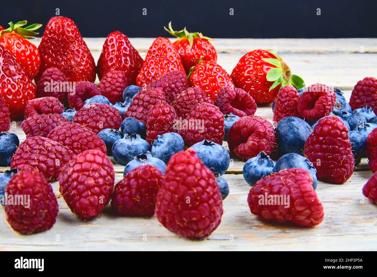 Healthy mixed fruit and ingredients with strawberry, raspberry ...