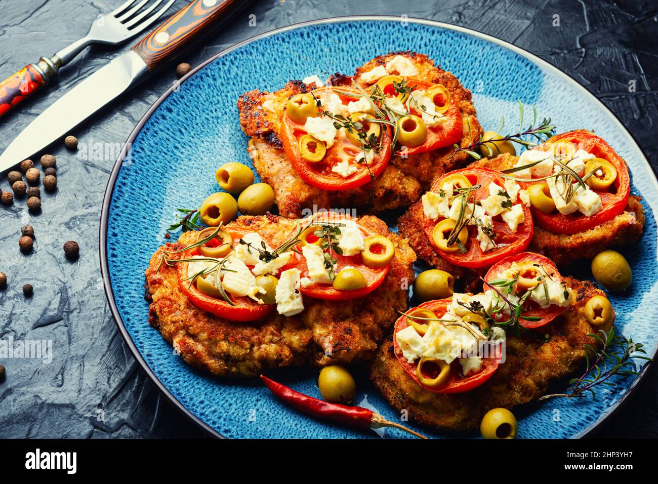 Schnitzel, breaded and fried thin layer of meat. Austrian dish Stock ...
