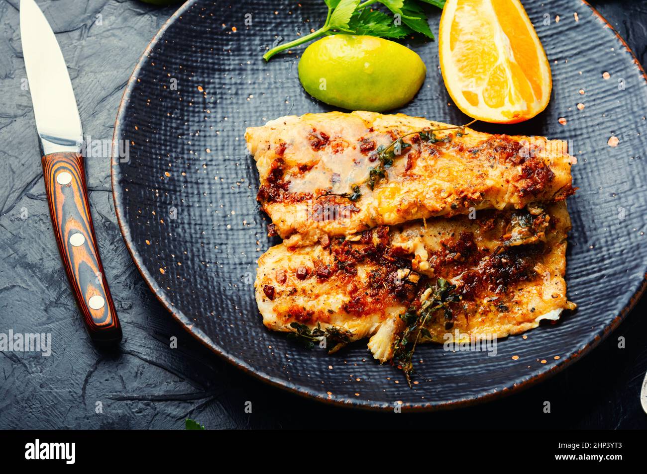 Fish fried in orange oil, delicious seafood. Filet o fish Stock Photo ...