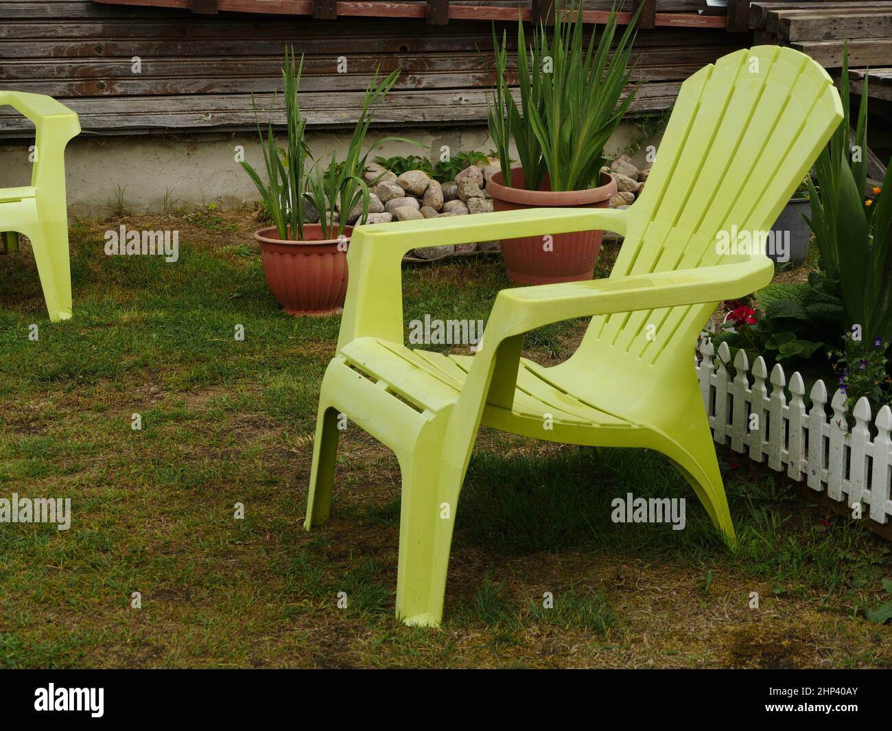 patio chairs the garden on green lawn grass for relax Stock Photo - Alamy
