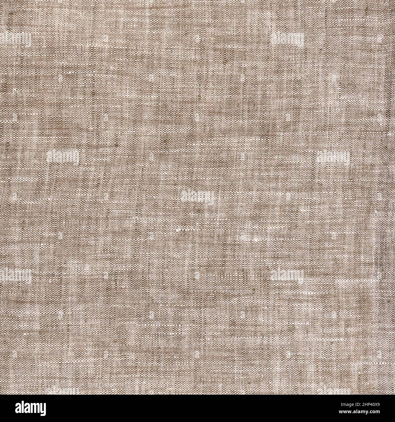 square textile background from brown linen fabric close up Stock Photo ...