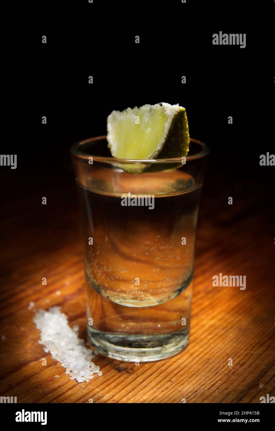 Tequila shot with lime slice and salt Stock Photo - Alamy