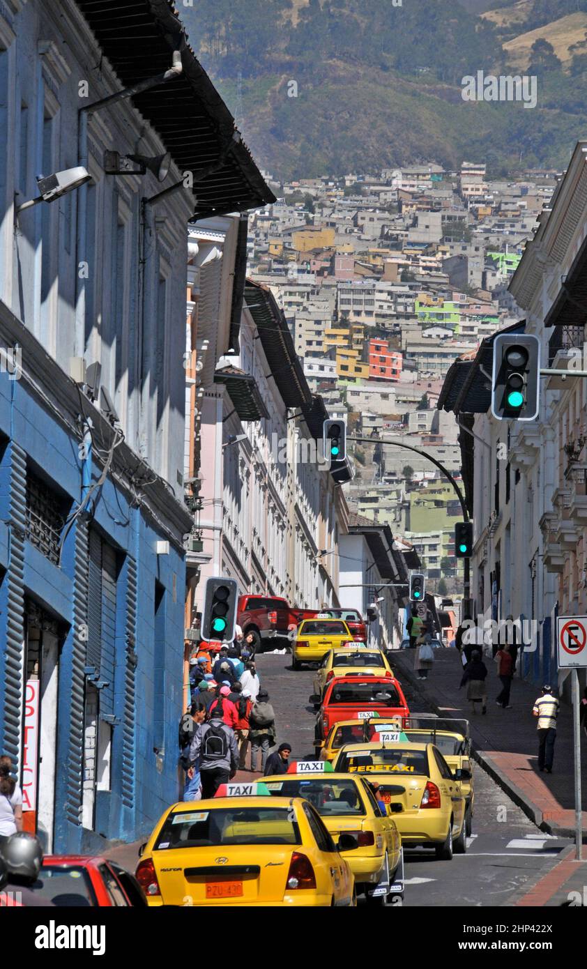 traffic in a narrow street of historic district of Quito city, Ecuador ...