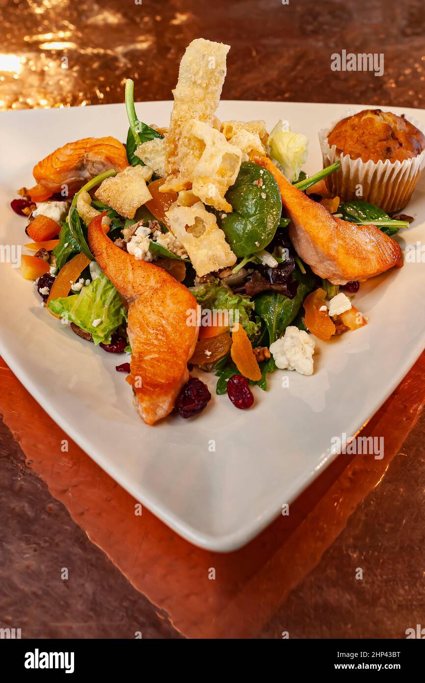 Savory chicken Caesar salad entree Stock Photo - Alamy