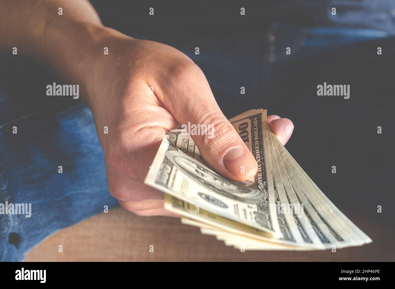 Passing money under the table hi-res stock photography and images - Alamy