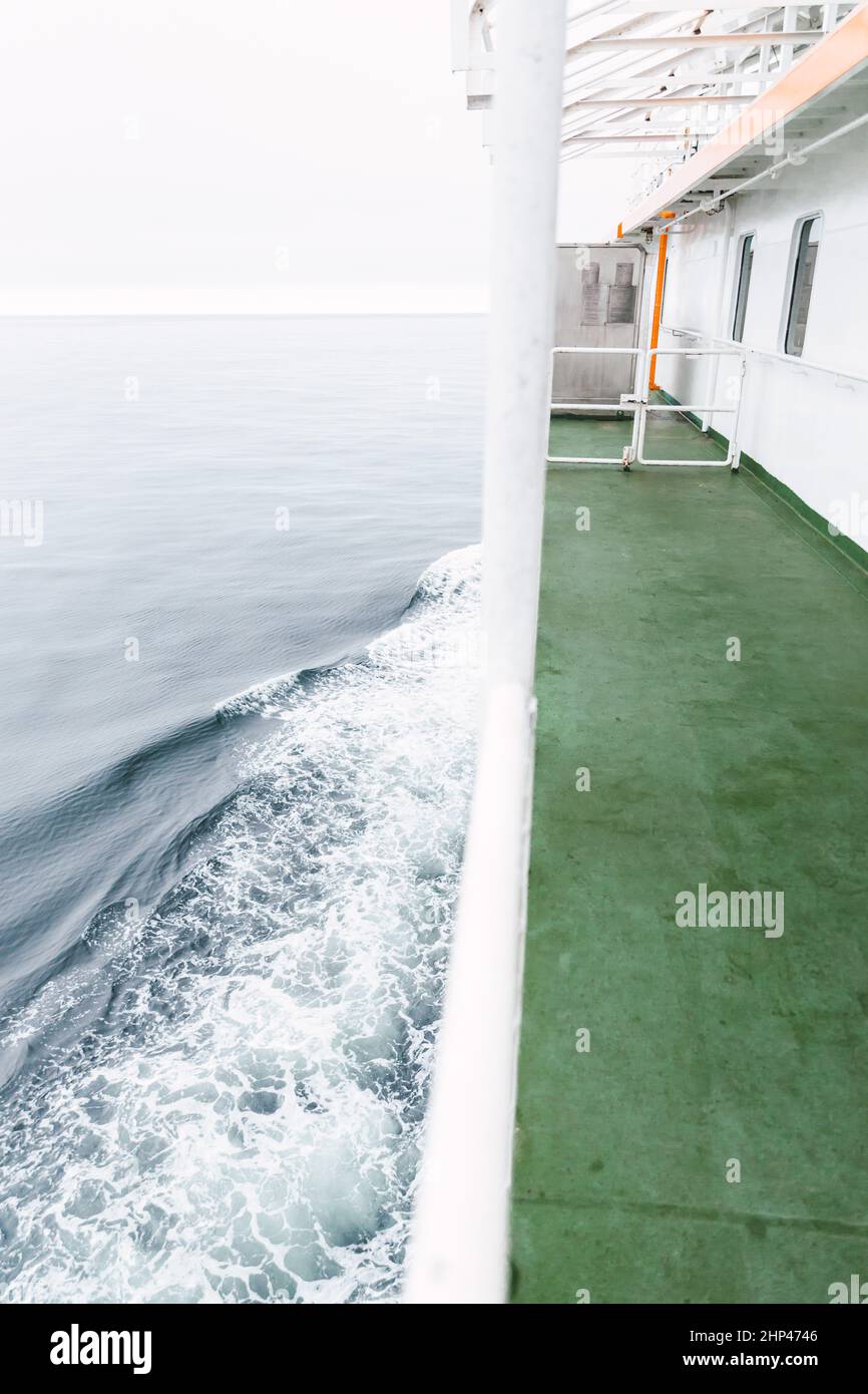 Lateral view of a wake water splash from a ferry boat in the chilean ...