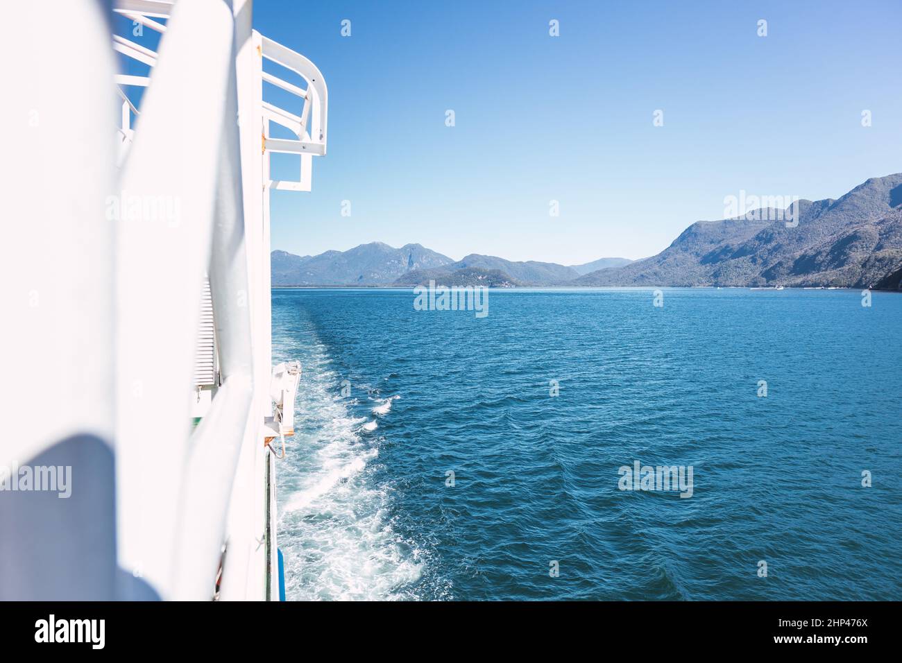 Lateral view of a wake water splash from a ferry boat in the chilean ...