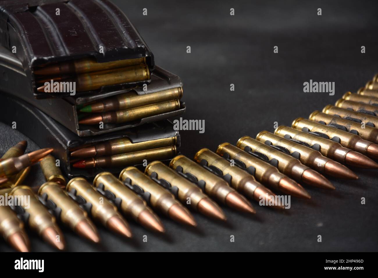 Photo of 5.56mm NATO Ammunition, machine gun bullets belt, rifle ...