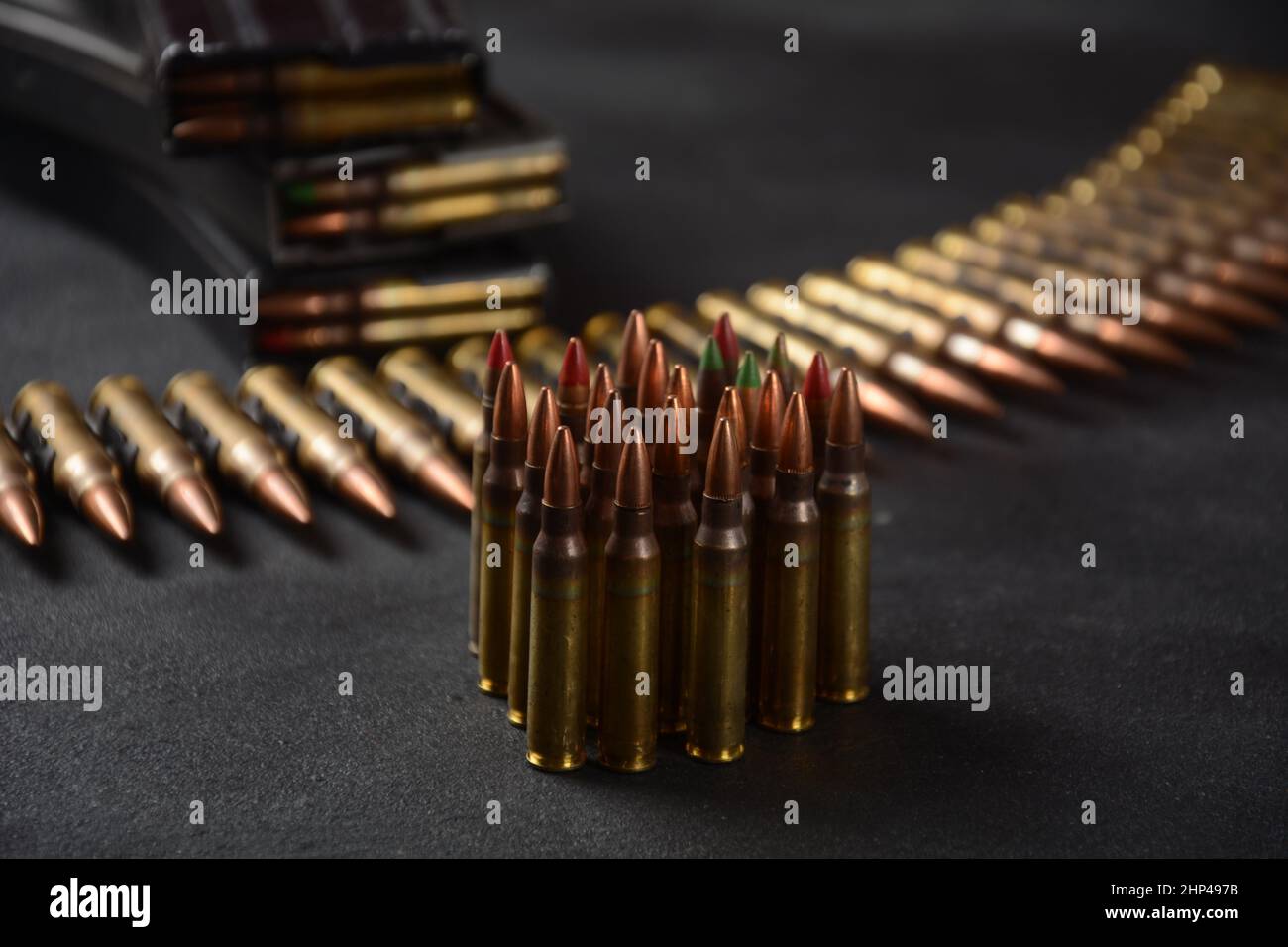 Photo of 5.56mm NATO Ammunition, machine gun bullets belt, rifle ...