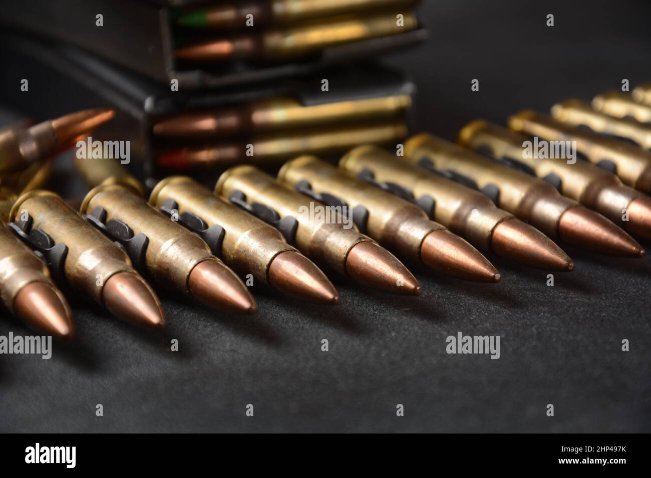 Photo of 5.56mm NATO Ammunition, machine gun bullets belt, rifle ...