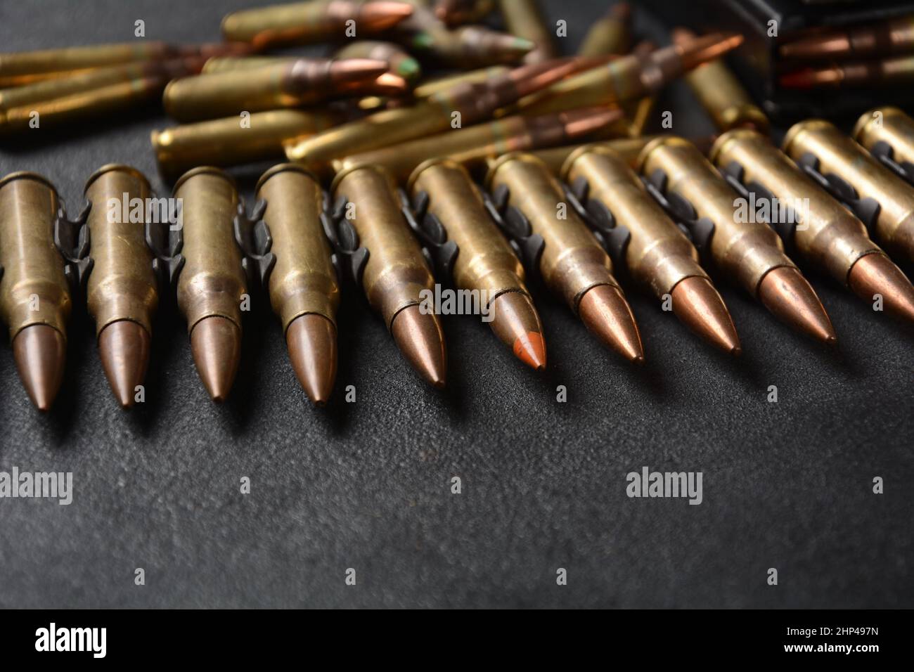 Photo of 5.56mm NATO Ammunition, machine gun bullets belt, rifle ...