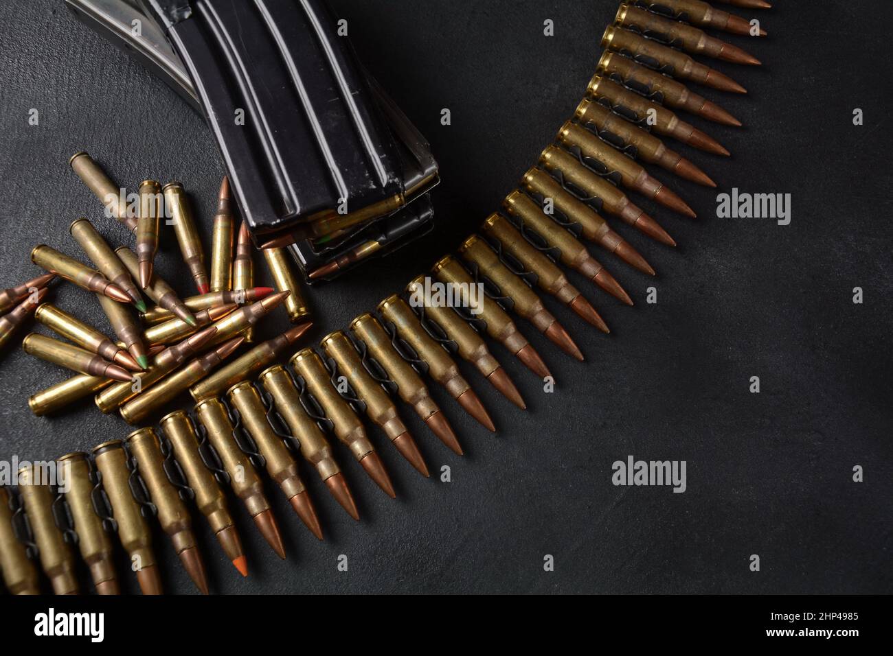 Photo of 5.56mm NATO Ammunition, machine gun bullets belt, rifle ...