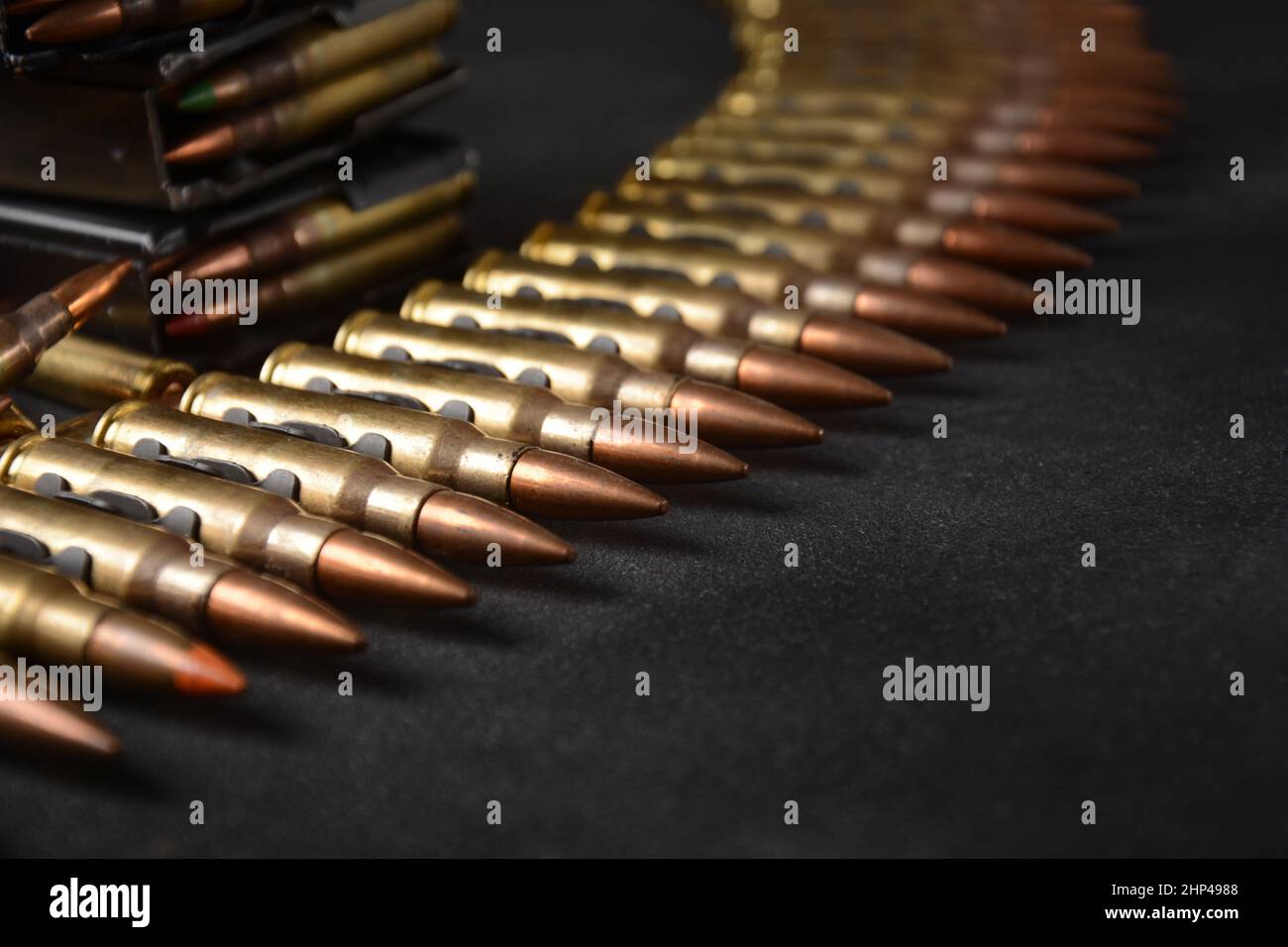 Photo of 5.56mm NATO Ammunition, machine gun bullets belt, rifle ...