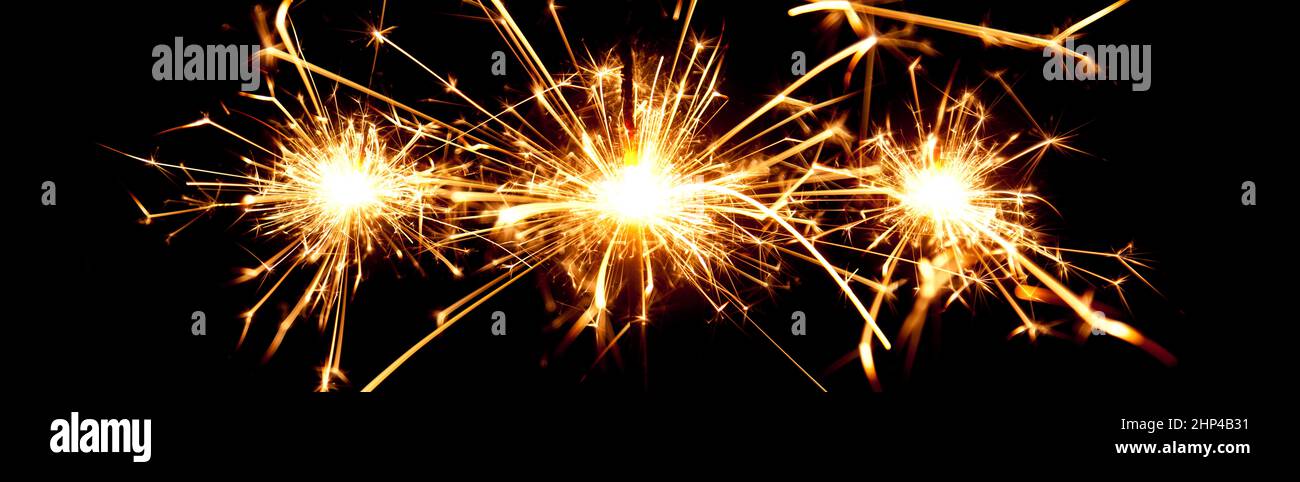 Burning sparklers for the new year festival. Background for christmas ...