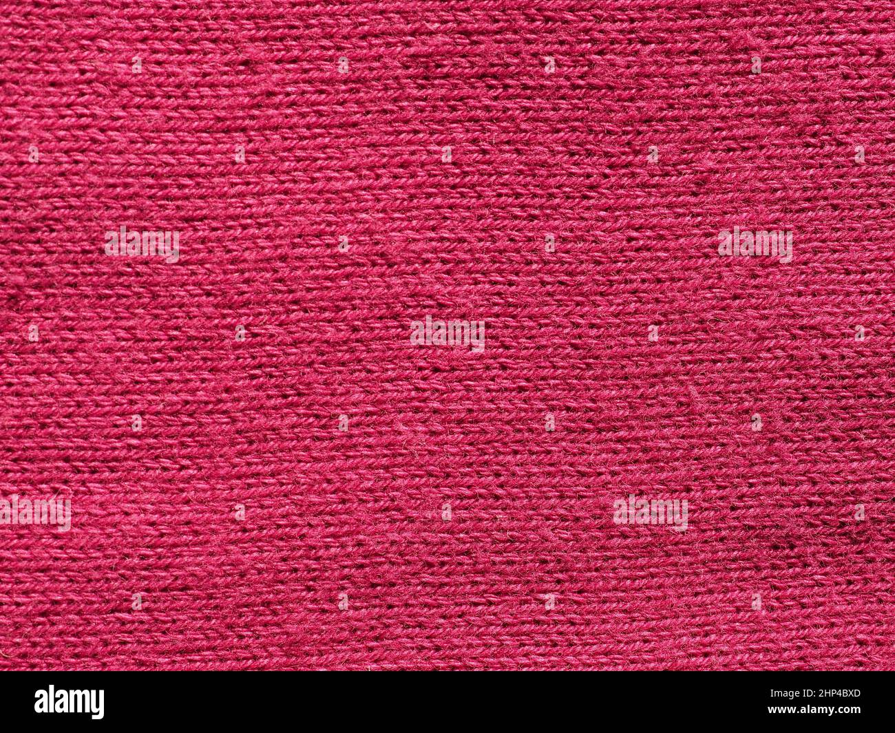 purple pink wool fabric texture useful as a background Stock Photo - Alamy
