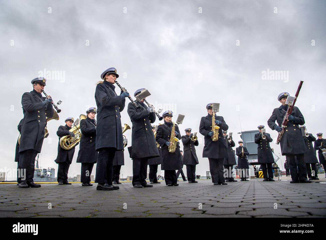 Wilhelmshaven, Germany. 18th Feb, 2022. The band plays on the arrival ...